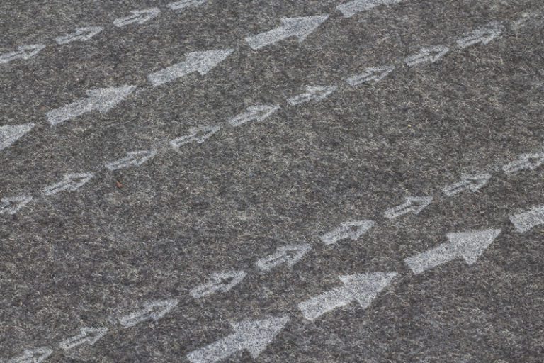 Printing Installation Arrows on Carpet Backing - Pannier Corporation